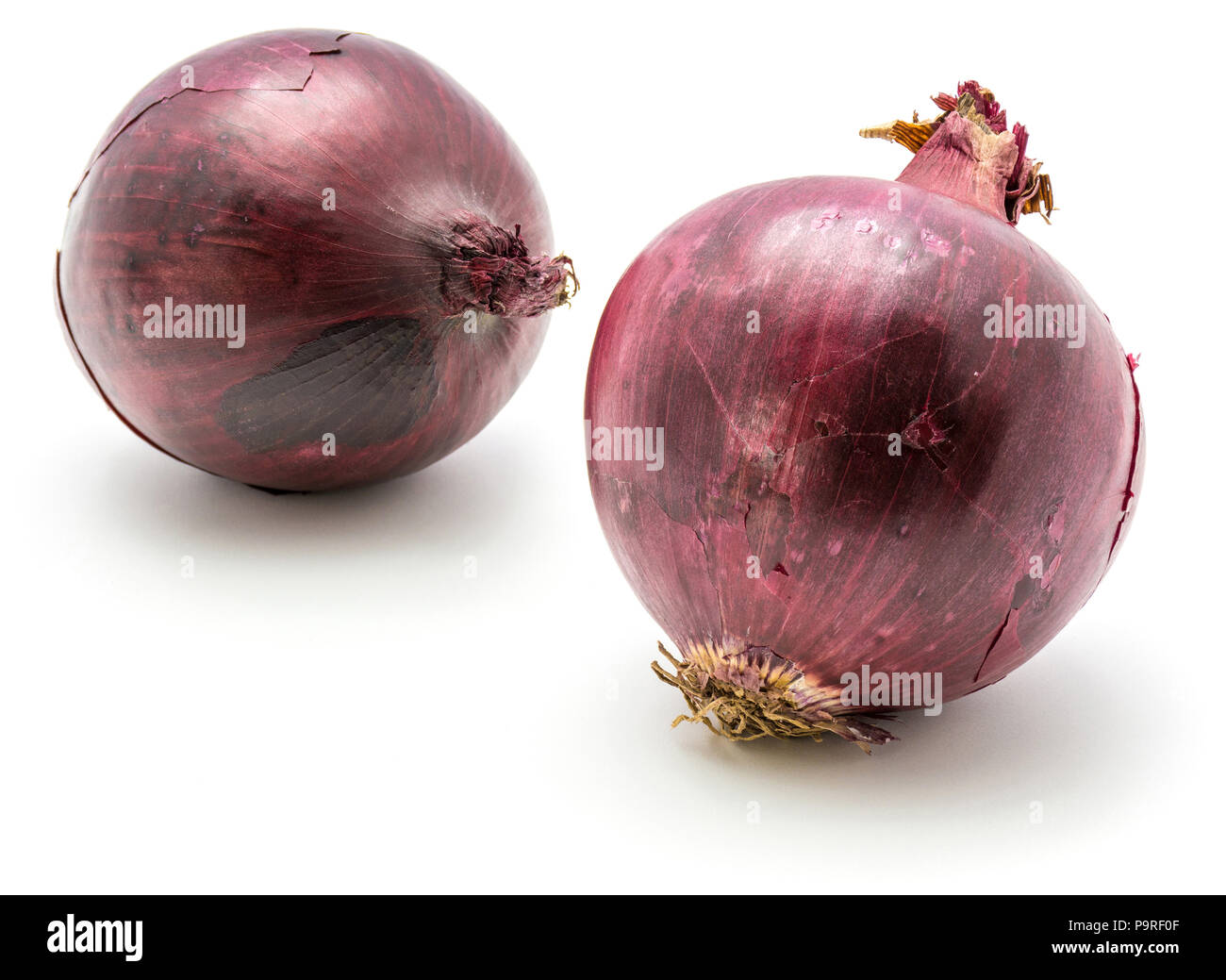 Two red onion isolated on white background Stock Photo - Alamy