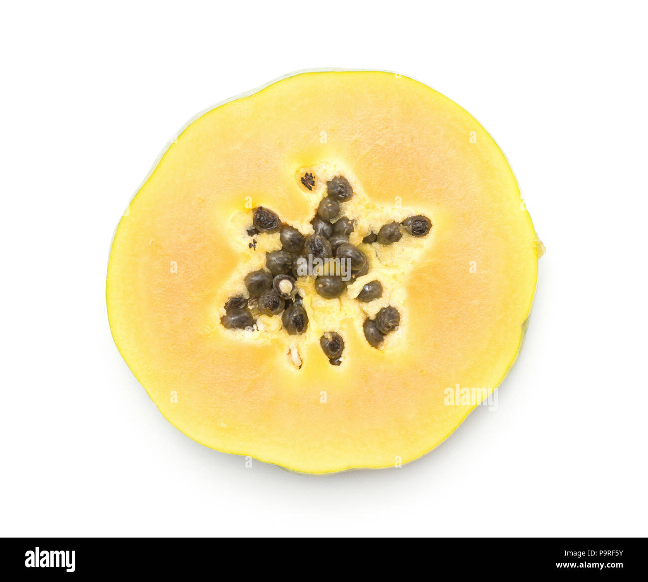 Green papaya half (pawpaw, papaw) top view with seeds orange flesh ...