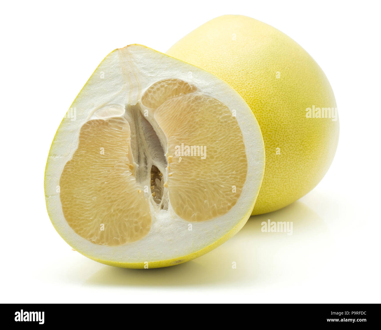 Pamelo isolated on white background one whole and sliced cross section ...