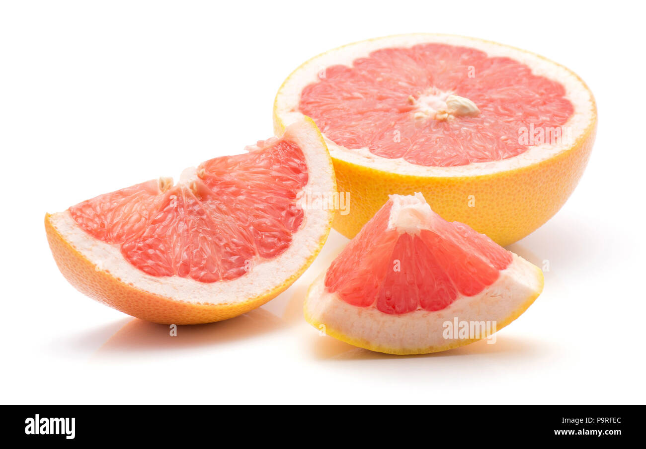 Sliced red grapefruit isolated on white background comparing one half ...