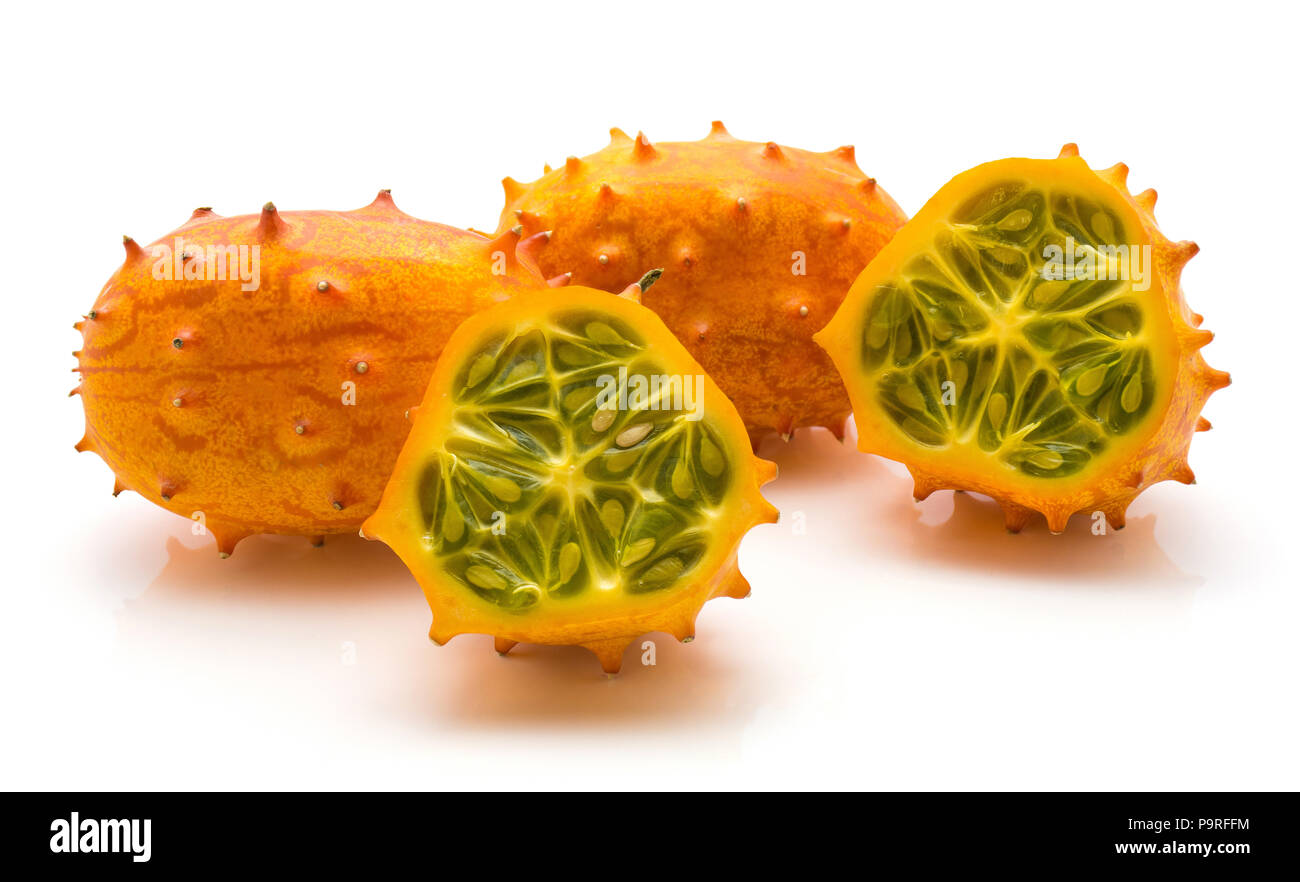Kiwano isolated on white background two whole one cut in half Stock ...