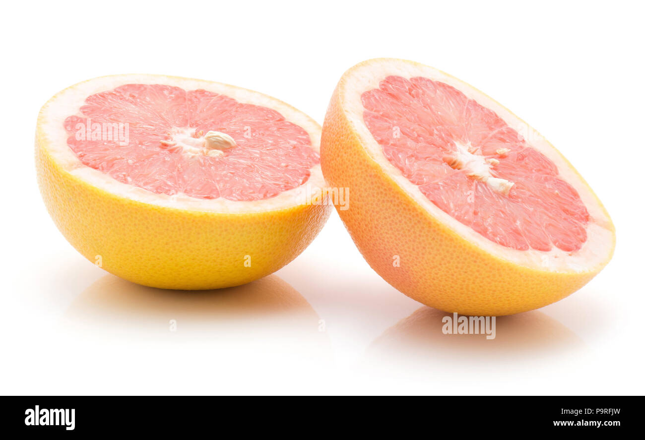 Two red grapefruit halves isolated on white background cross section Stock Photo - Alamy