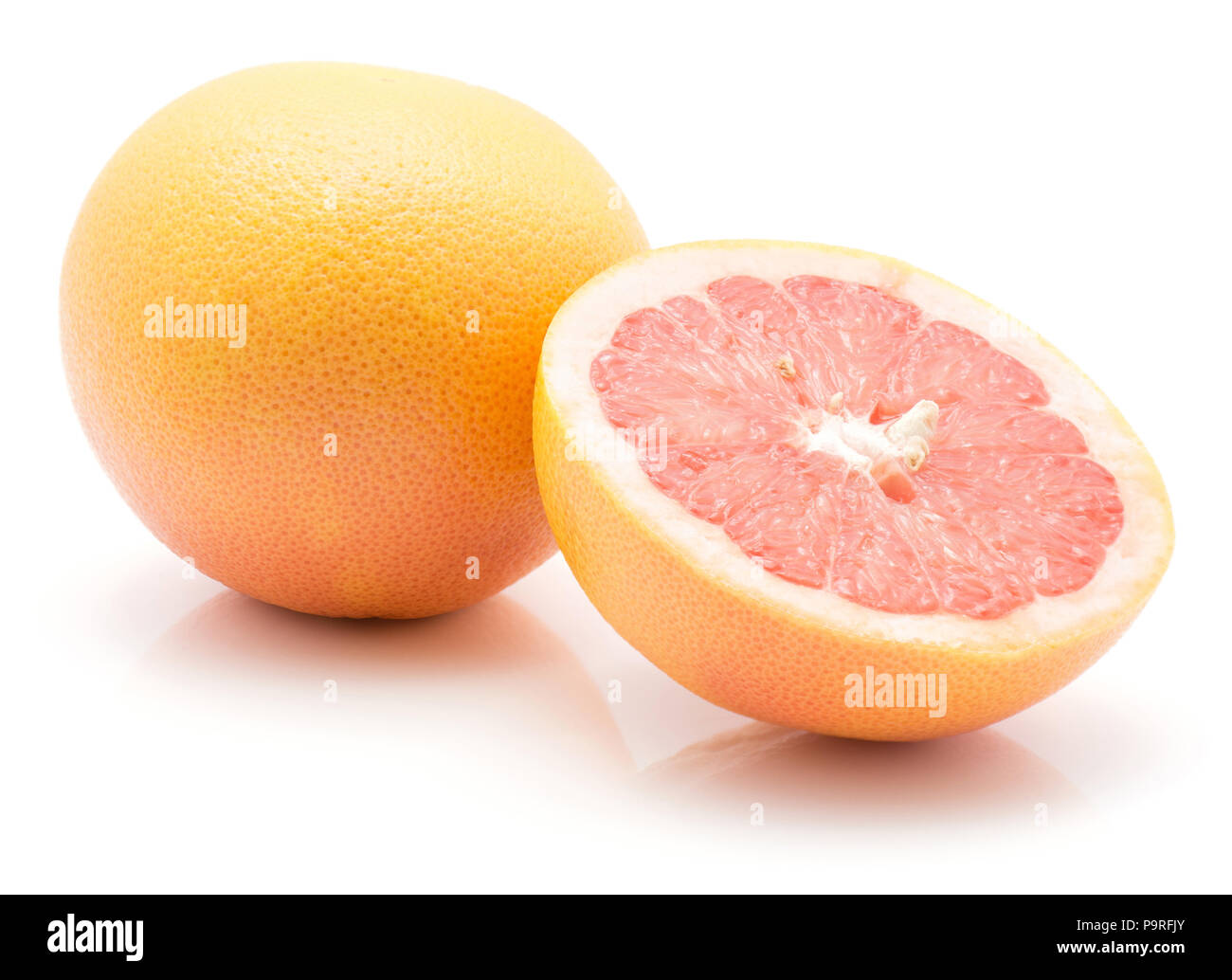 Red grapefruit isolated on white background one whole and one cross ...