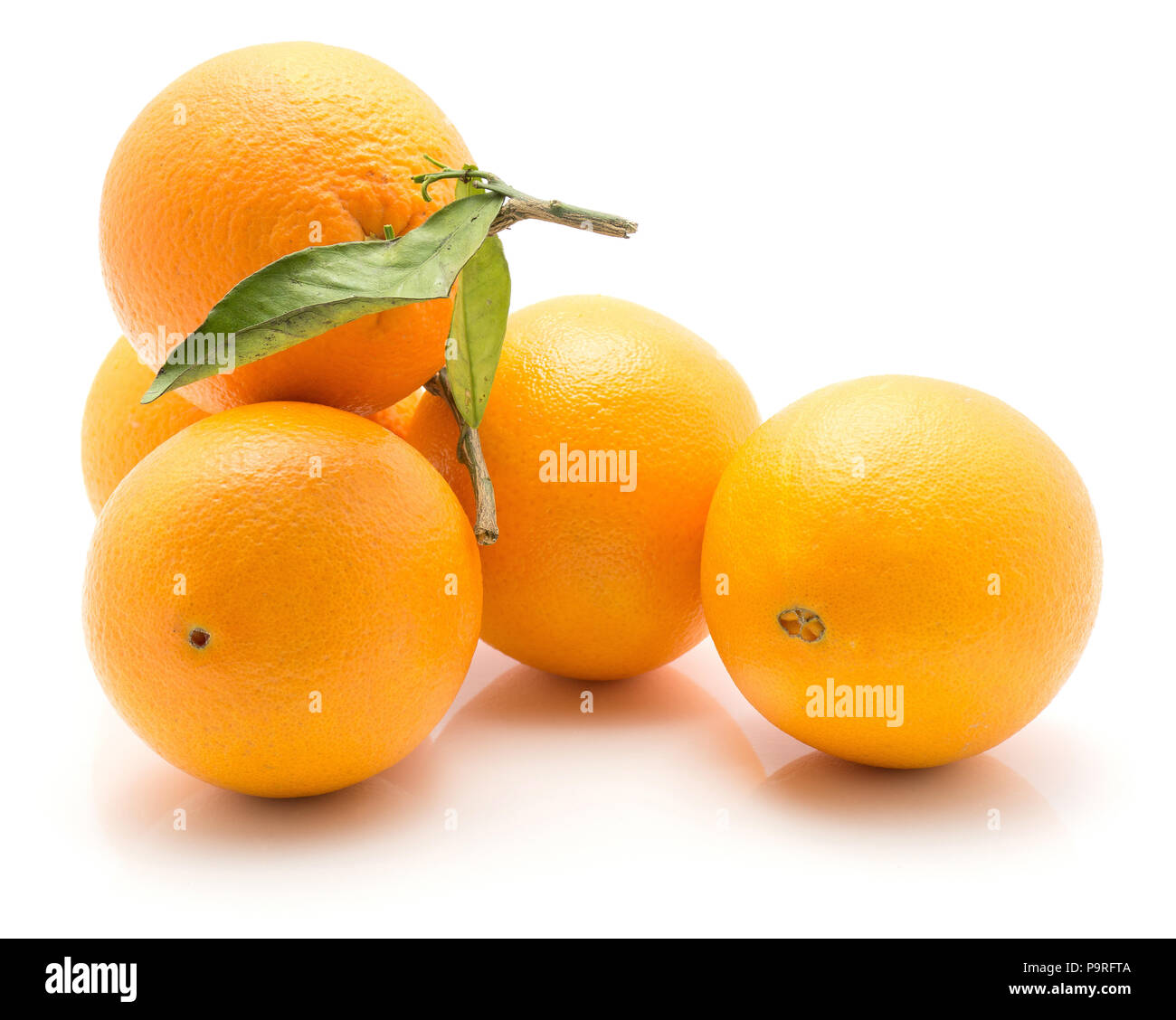 Oranges with green leaf isolated on white background five whole Stock ...