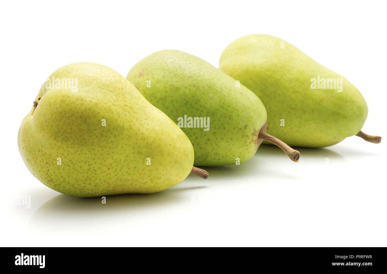 Three green pears isolated on white background in row Stock Photo - Alamy