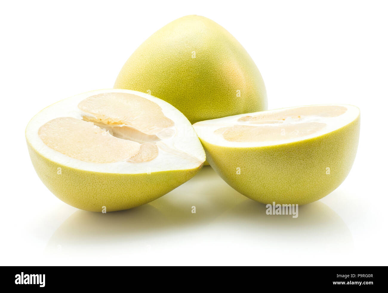 Pamelo isolated on white background one whole and one cut in half Stock ...