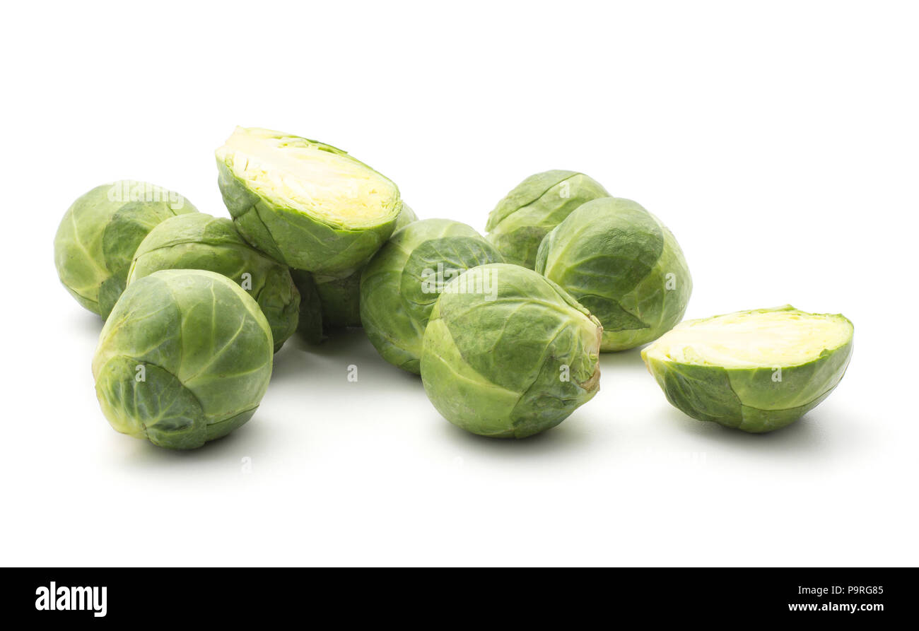Raw Brussels sprout stack isolated on white background heads and two ...