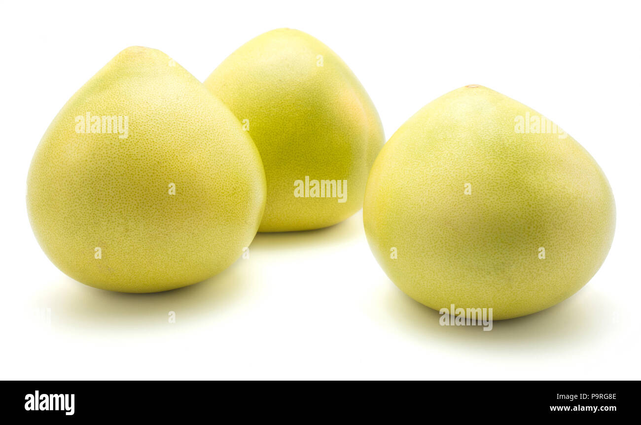 Three pamelo isolated on white background Stock Photo - Alamy