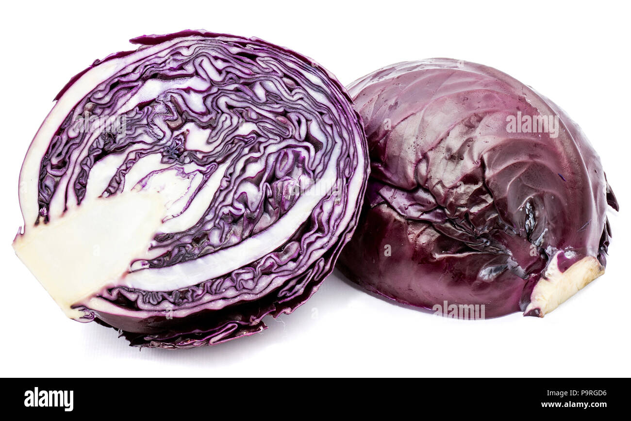 Two sliced halves of one whole purple cabbage isolated on white ...