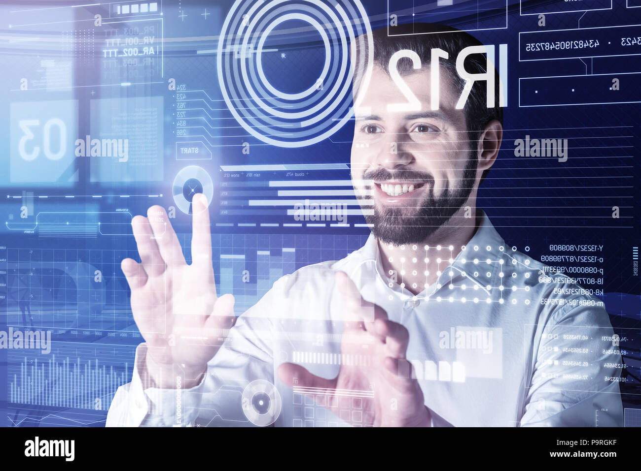 Happiness. Positive enthusiastic IT manager feeling impressed and ...
