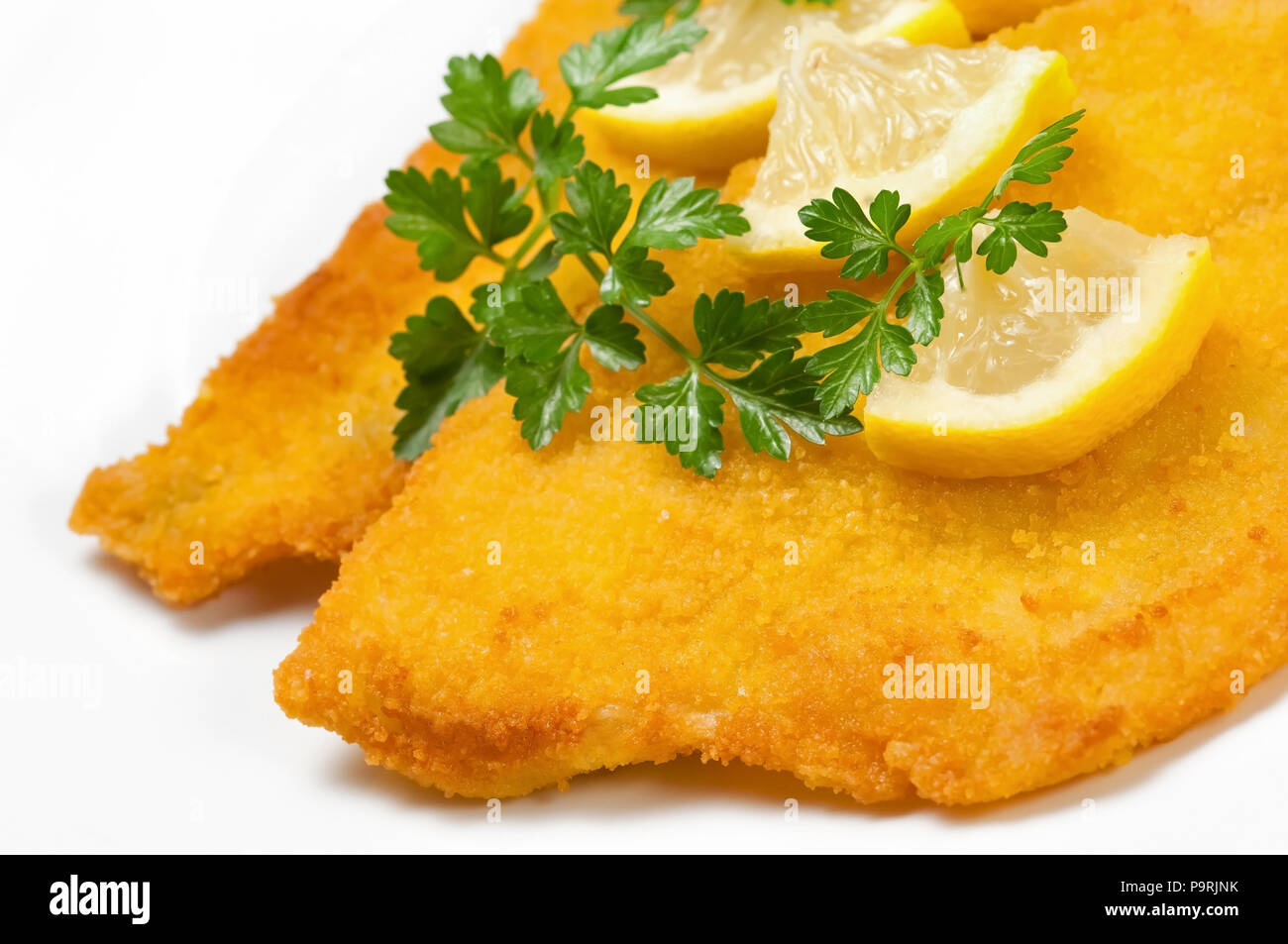Fish cutlets on white background Stock Photo - Alamy
