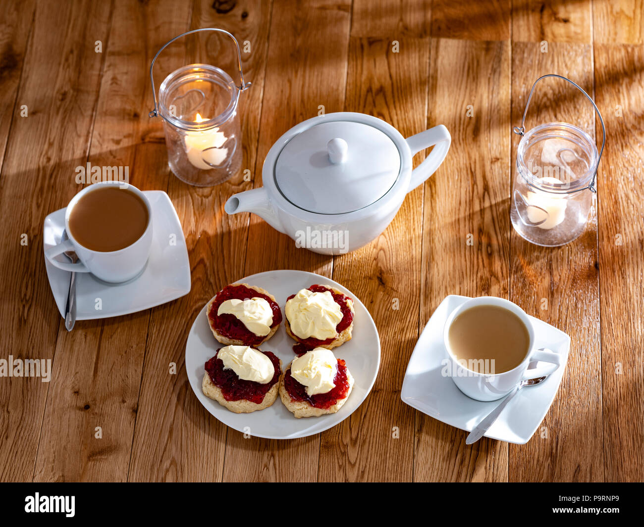 Cornish Cream Tea white crockery, tea pot, cups and saucers Stock Photo ...