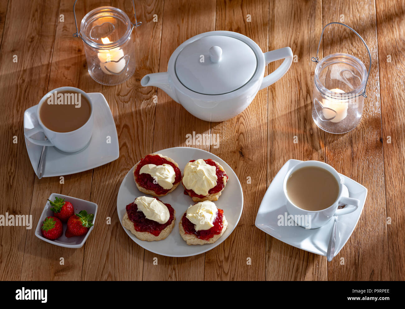 Cornish Cream Tea white crockery, tea pot, cups and saucers Stock Photo ...