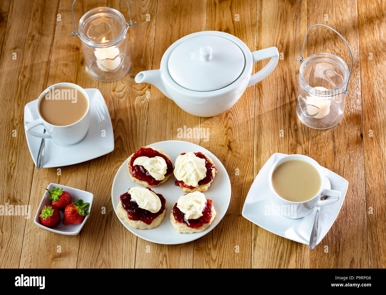 Cornish Cream Tea white crockery, tea pot, cups and saucers Stock Photo ...