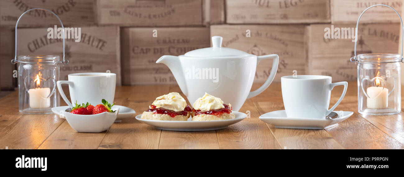 Cornish Cream Tea white crockery, tea pot, cups and saucers Stock Photo ...