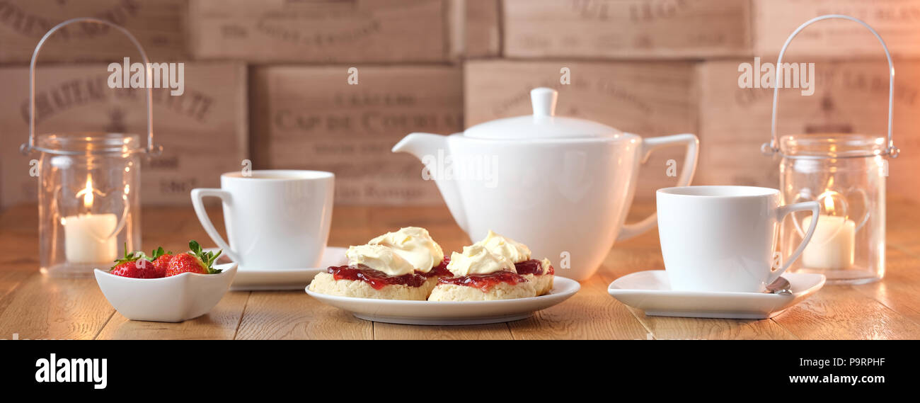 Cornish Cream Tea white crockery, tea pot, cups and saucers Stock Photo ...
