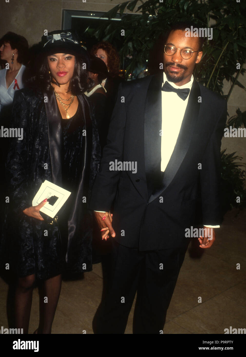 BEVERLY HILLS, CA - MARCH 22: (L-R) Tasha Lewis and director John ...