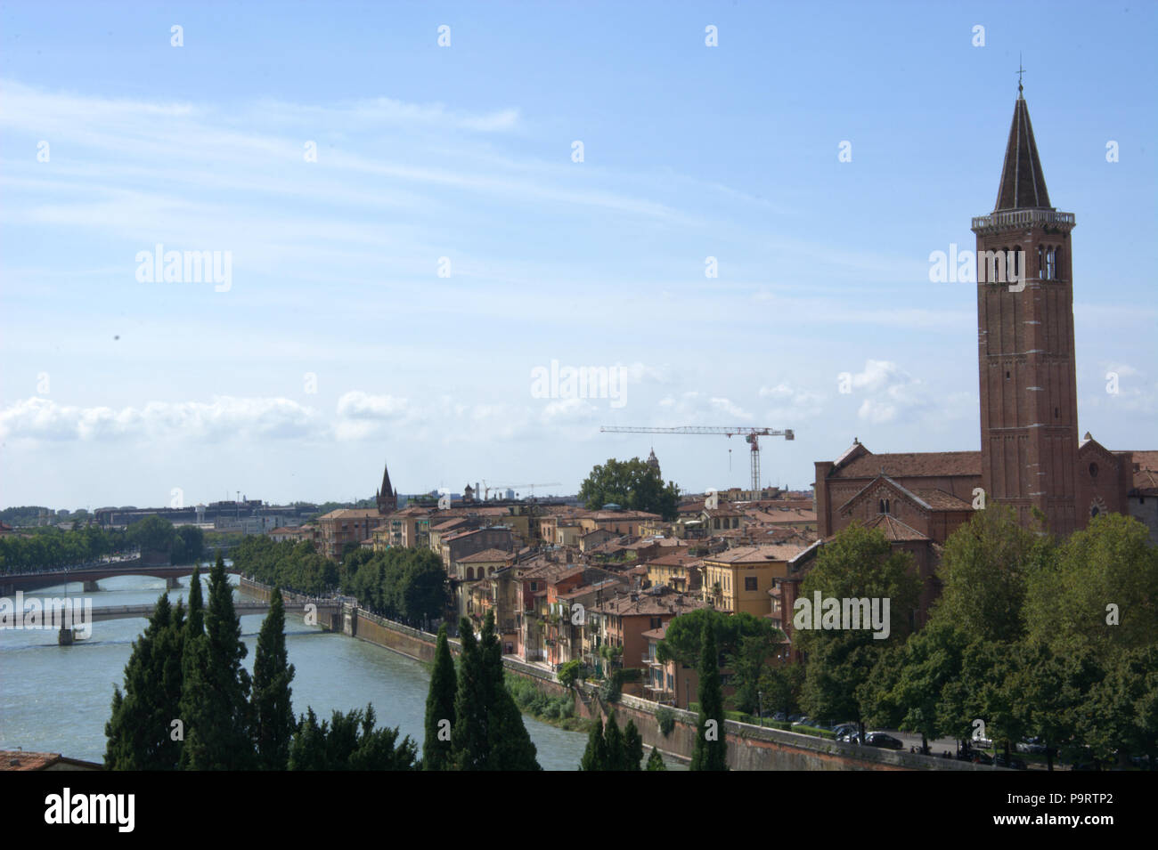 The Adige river flows through the beautiful Verona Stock Photo - Alamy