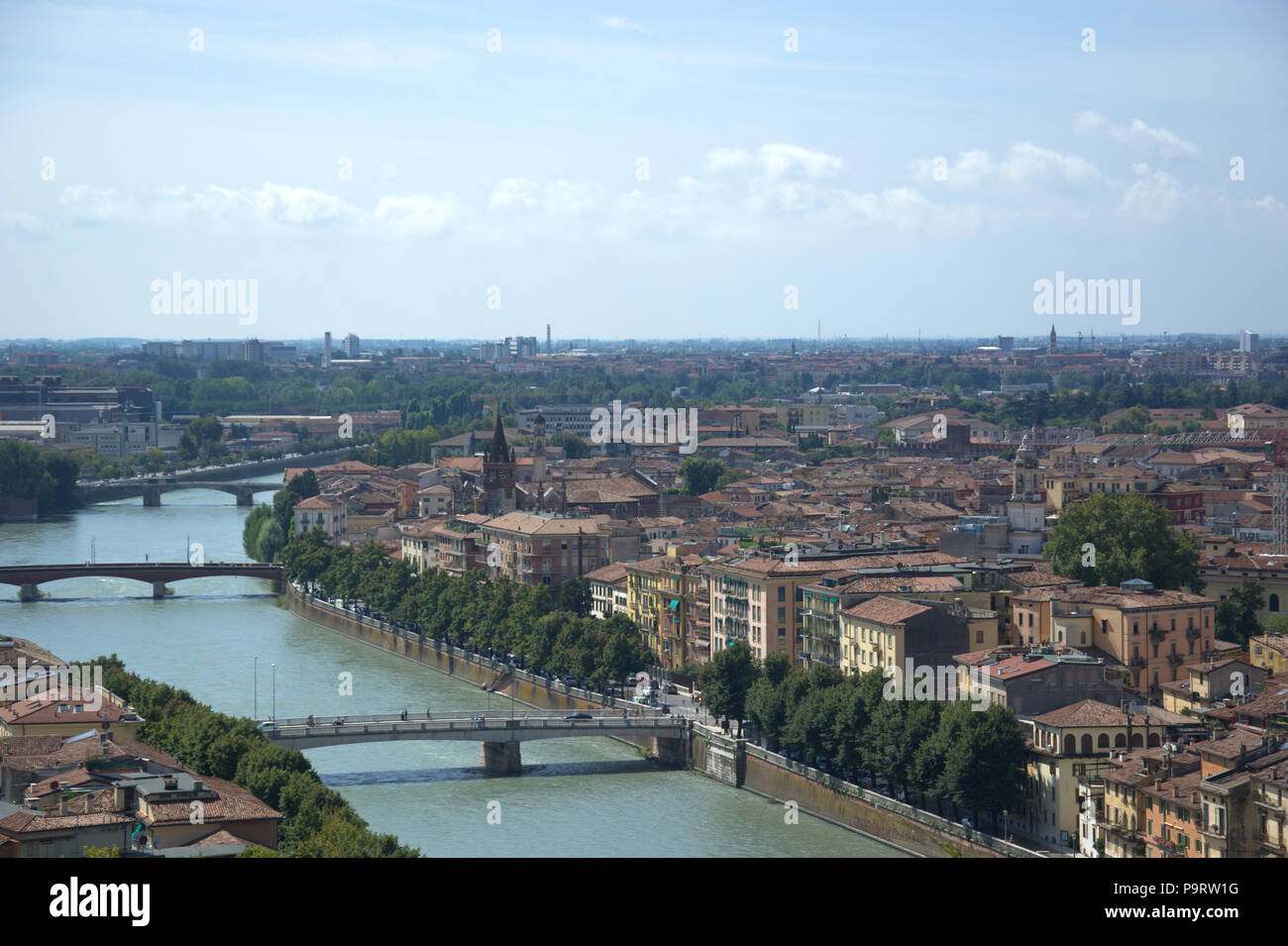The Adige river flows through the beautiful Verona Stock Photo - Alamy