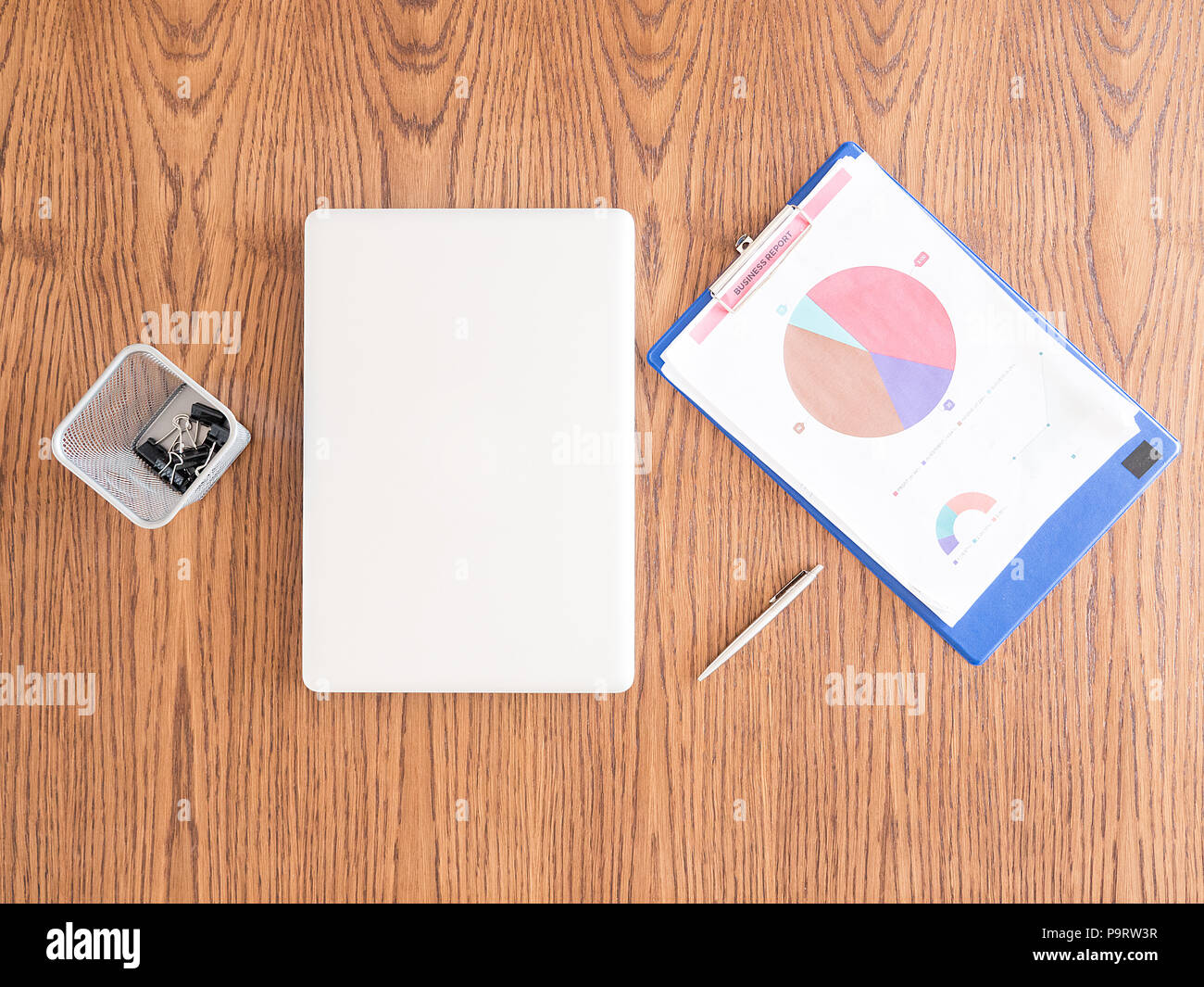 Closed computer on a businessman desk. Top view Stock Photo - Alamy