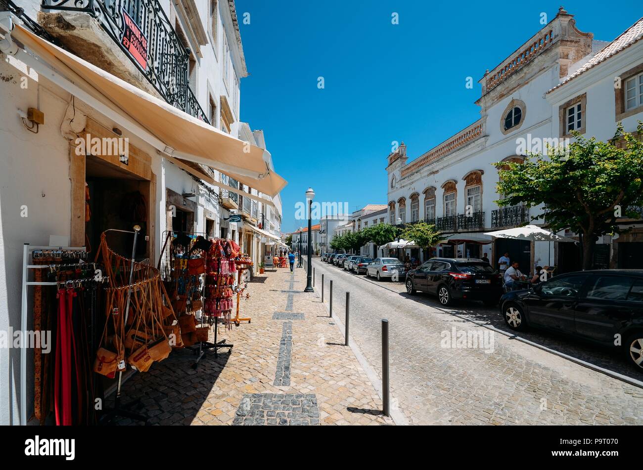 Cobblestone streets of Tavira town on the Algarve in southern Portugal ...