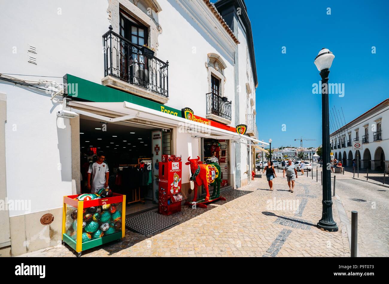 Cobblestone streets of Tavira town on the Algarve in southern Portugal ...