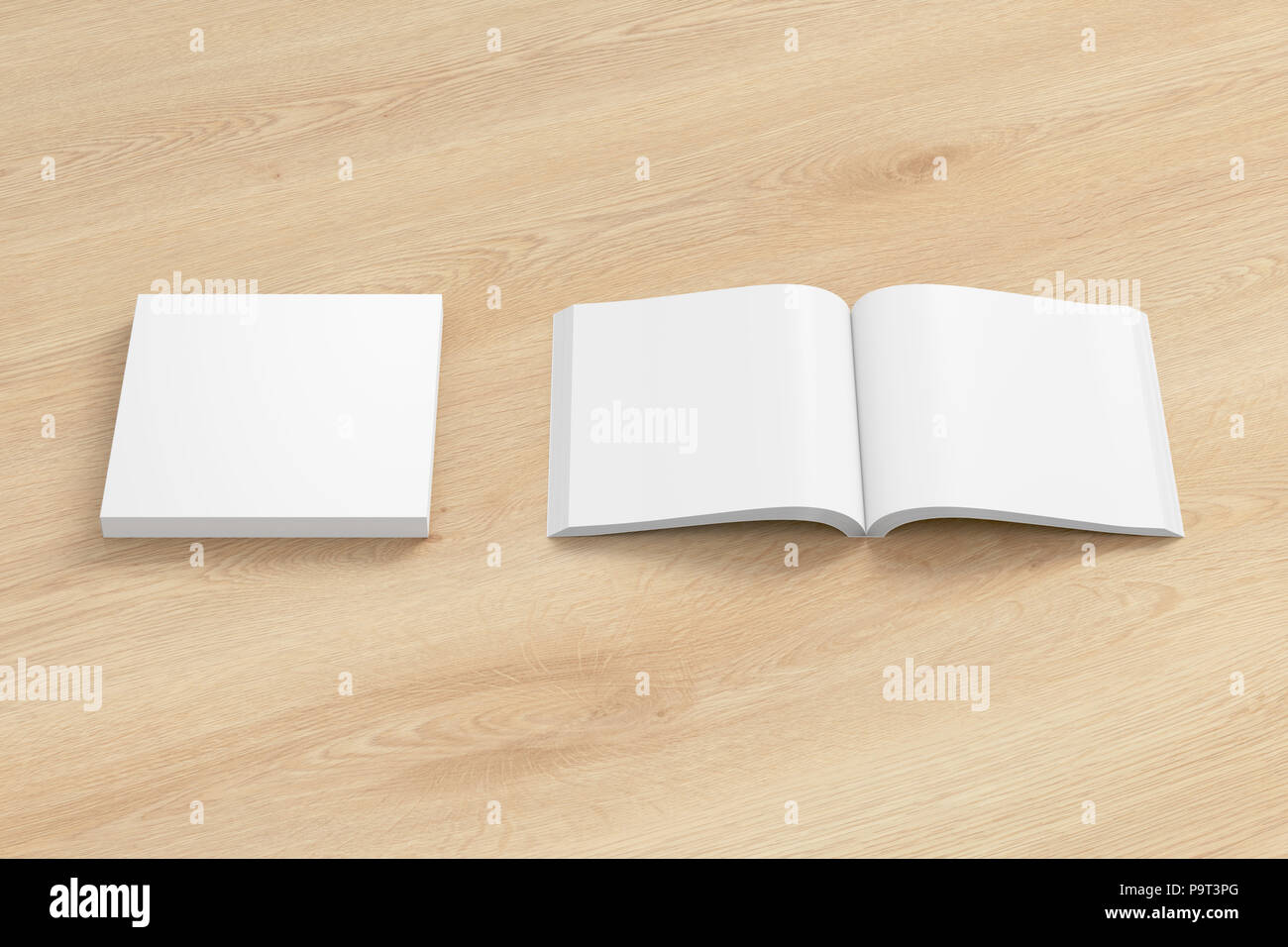 Blank white square soft cover book with glossy paper on wooden ...