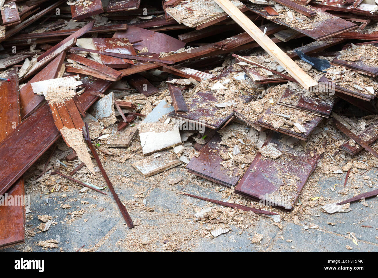 Pile of garbage outside - Old wooden floor Stock Photo - Alamy