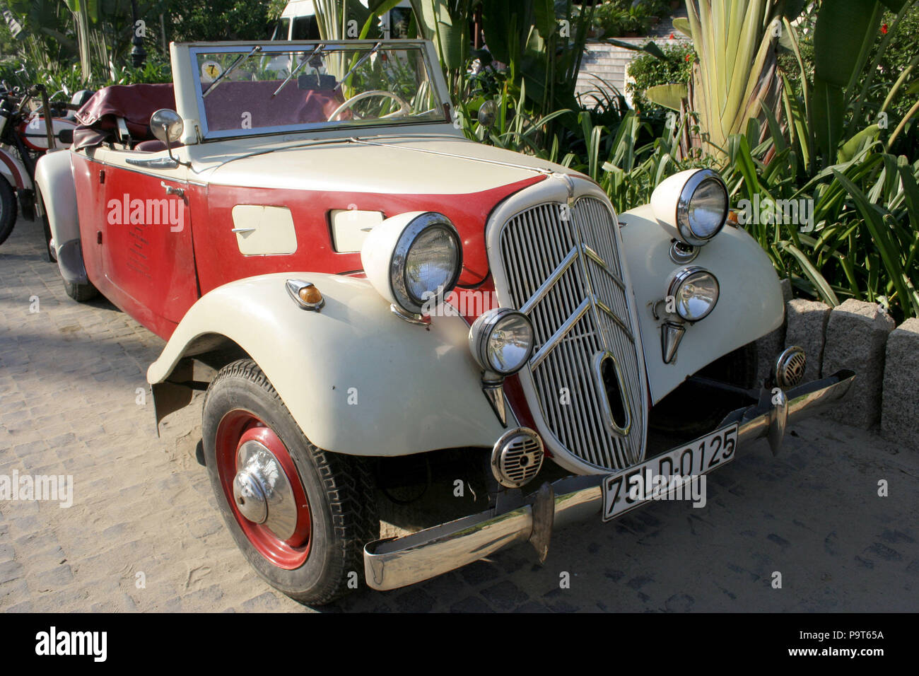 Red and White Vintage Car in Street, Vietnam Stock Photo - Alamy