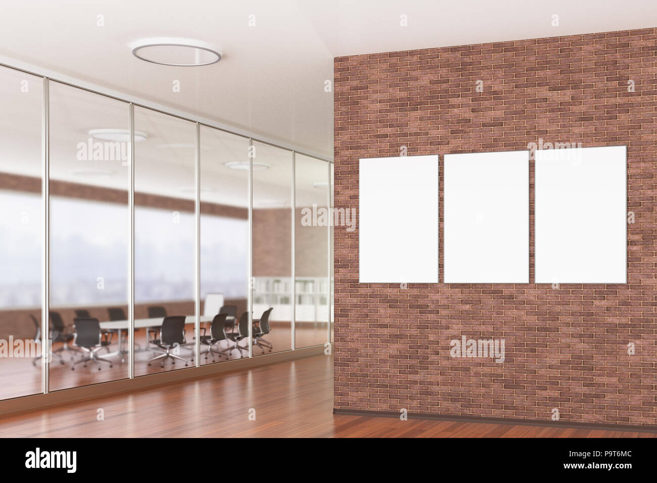 Three blank vertical posters on the wall in office interior with ...