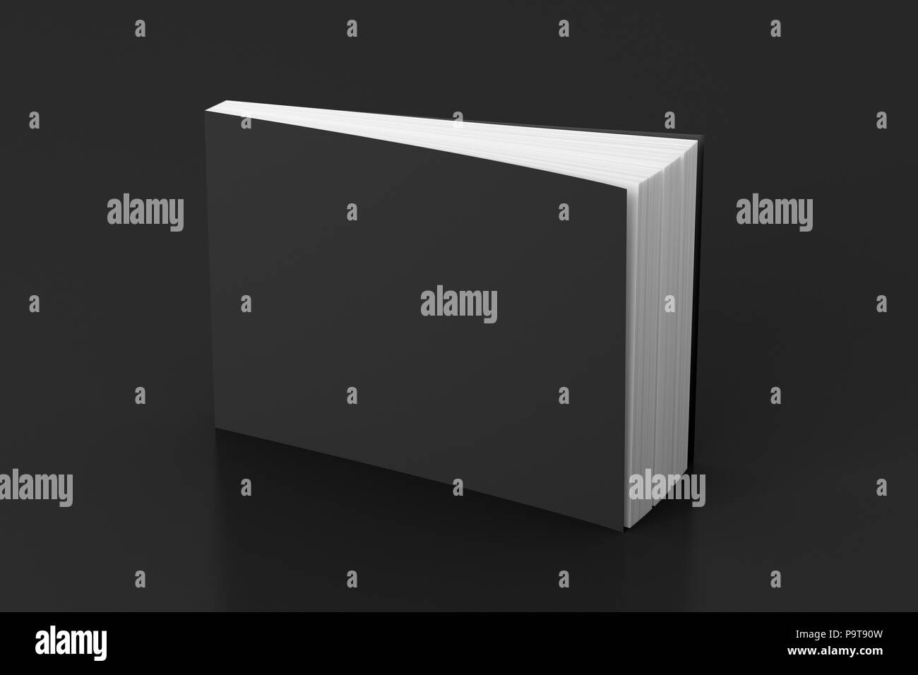 Blank black horizontal soft cover book standing on black background ...