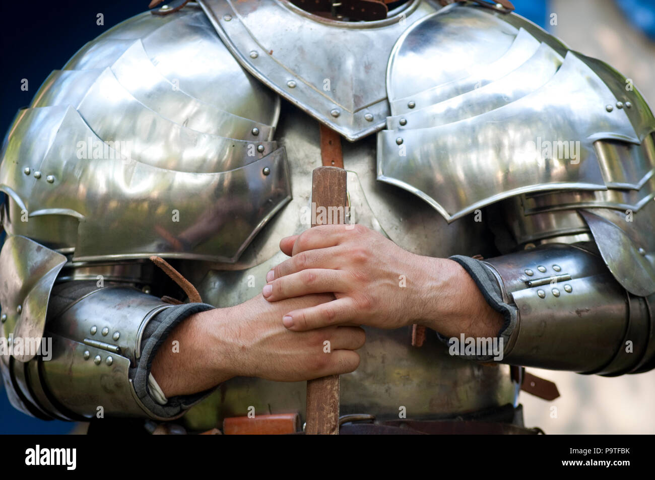Medieval Knight Dressing in Armor Stock Photo - Alamy