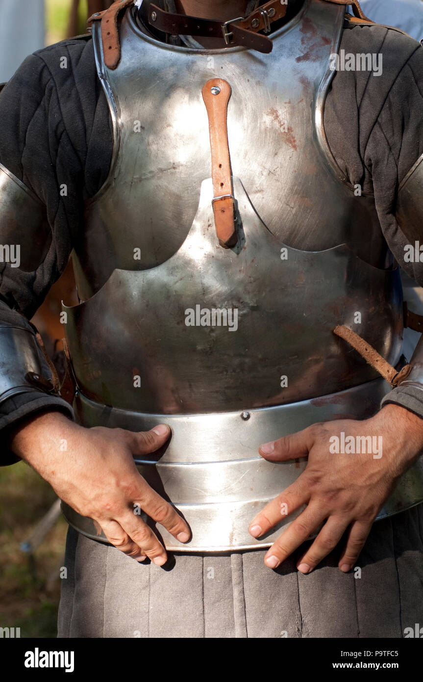 Medieval Knight Dressing in Armor Stock Photo - Alamy