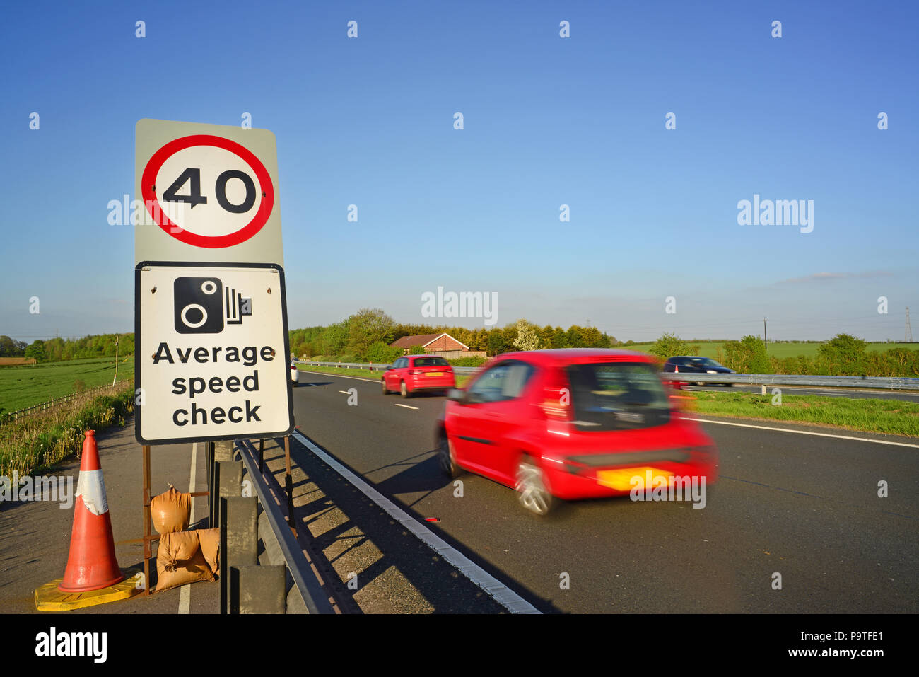 lorry passing warning sign of 40mph limit and speed camera warning sign ... lorry passing warning sign of 40mph limit and speed camera warning sign ...