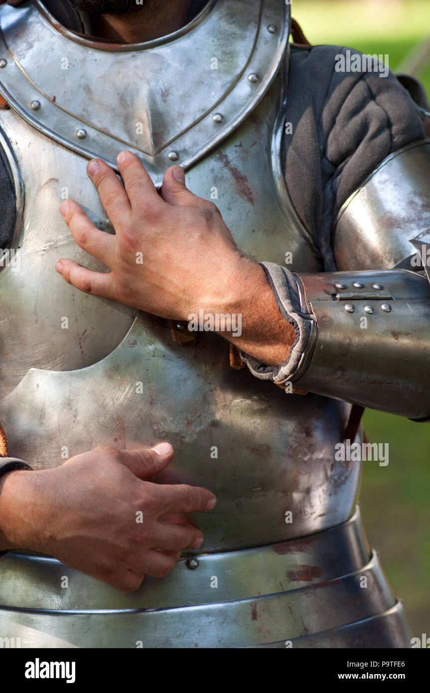 Medieval Knight Dressing in Armor Stock Photo - Alamy