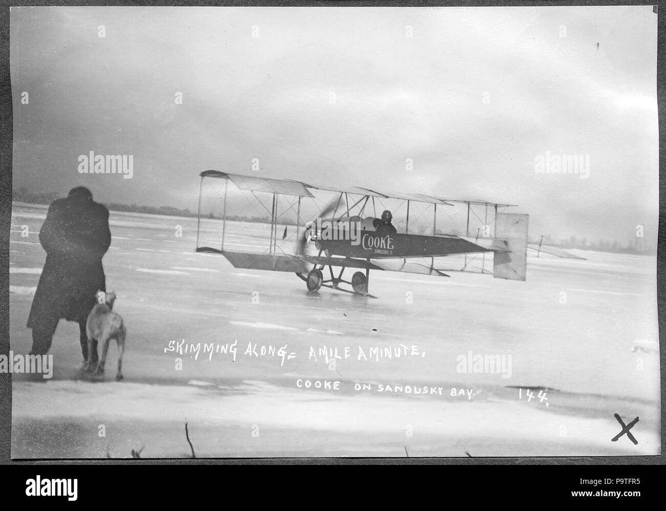 Biplane flying Black and White Stock Photos & Images - Alamy