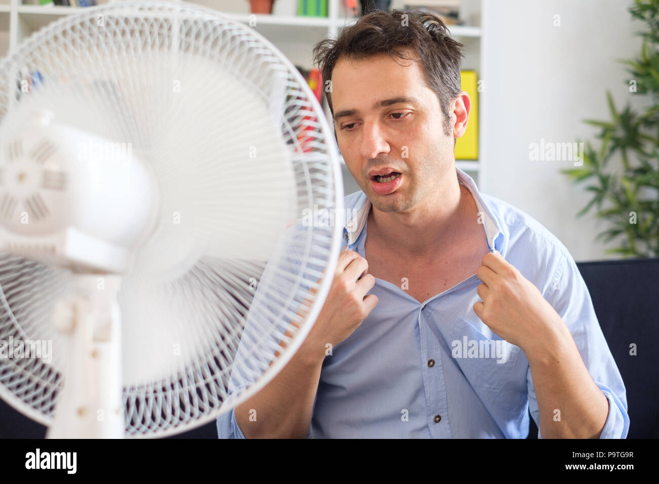 Hot weather man sofa hi-res stock photography and images - Alamy