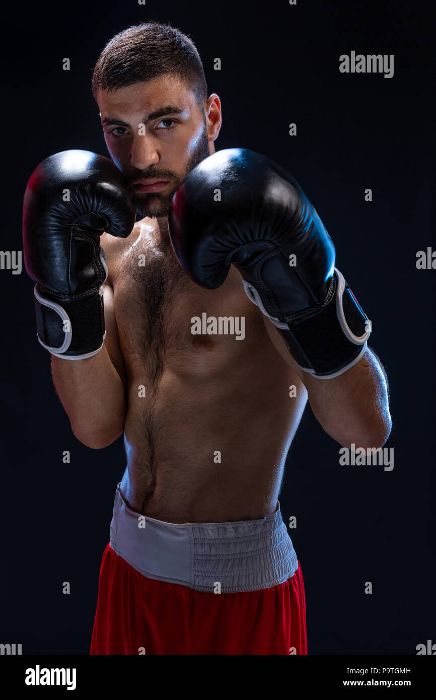 Double arm block. Boxing trainer showing defensive techniques. Combat ...