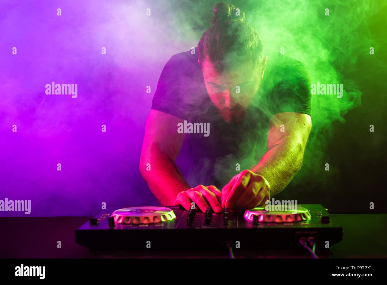 Dj Behind Turntables High Resolution Stock Photography and Images - Alamy