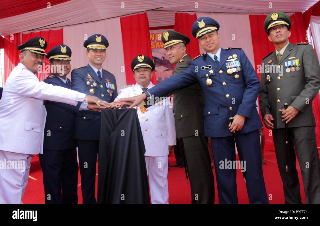 Madiun, Indonesia. 18th July, 2018. Madiun Regent Muhtarom [center ...