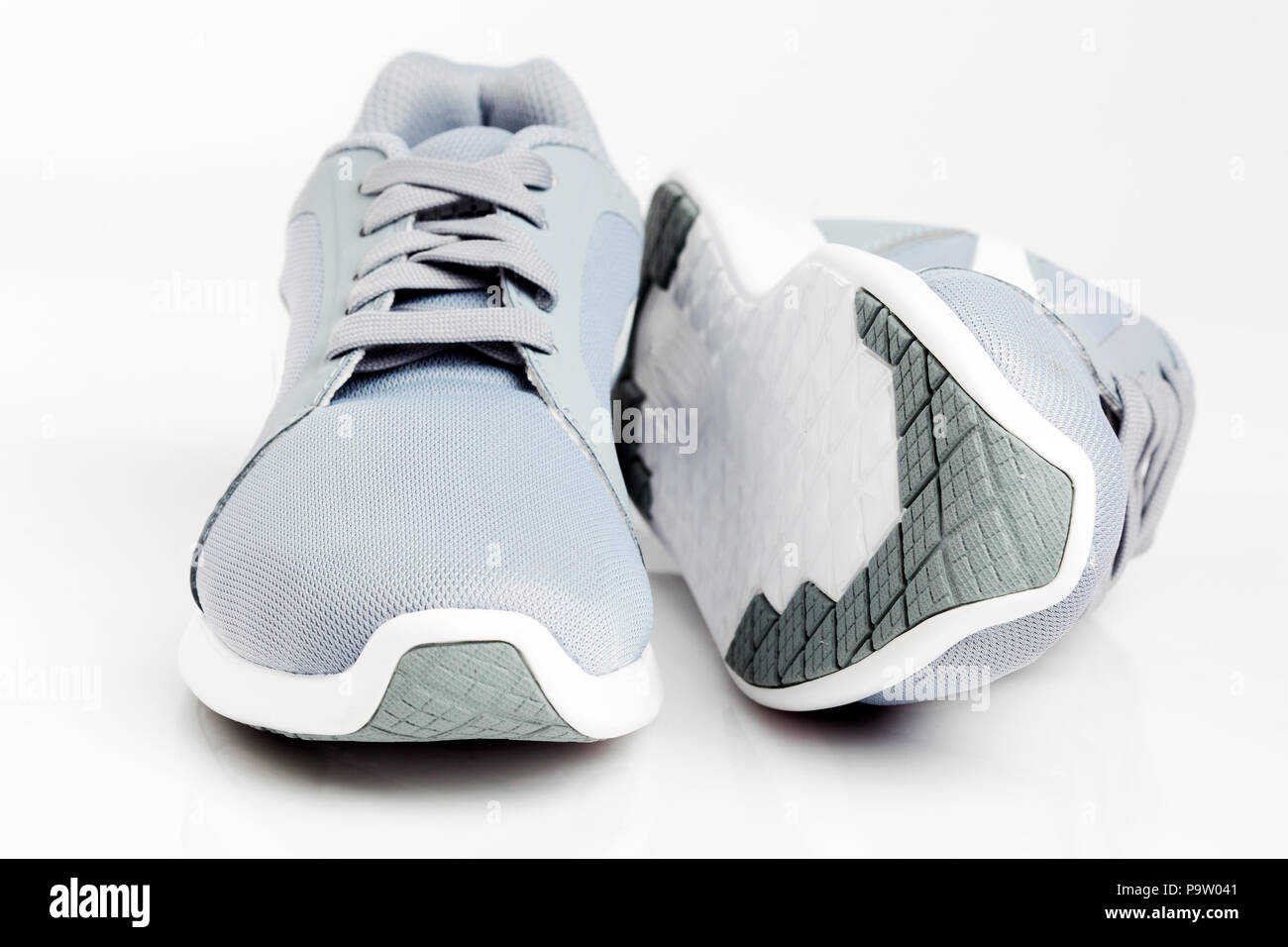 Sport running shoes isolated on white background Stock Photo - Alamy