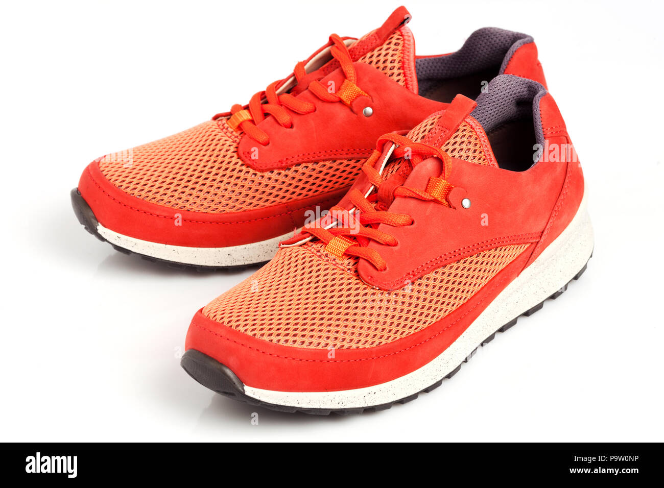 Sport running shoes isolated on white background Stock Photo - Alamy