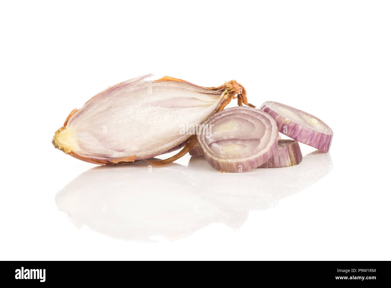 Sliced shallot rings stack and one section half isolated on white ...