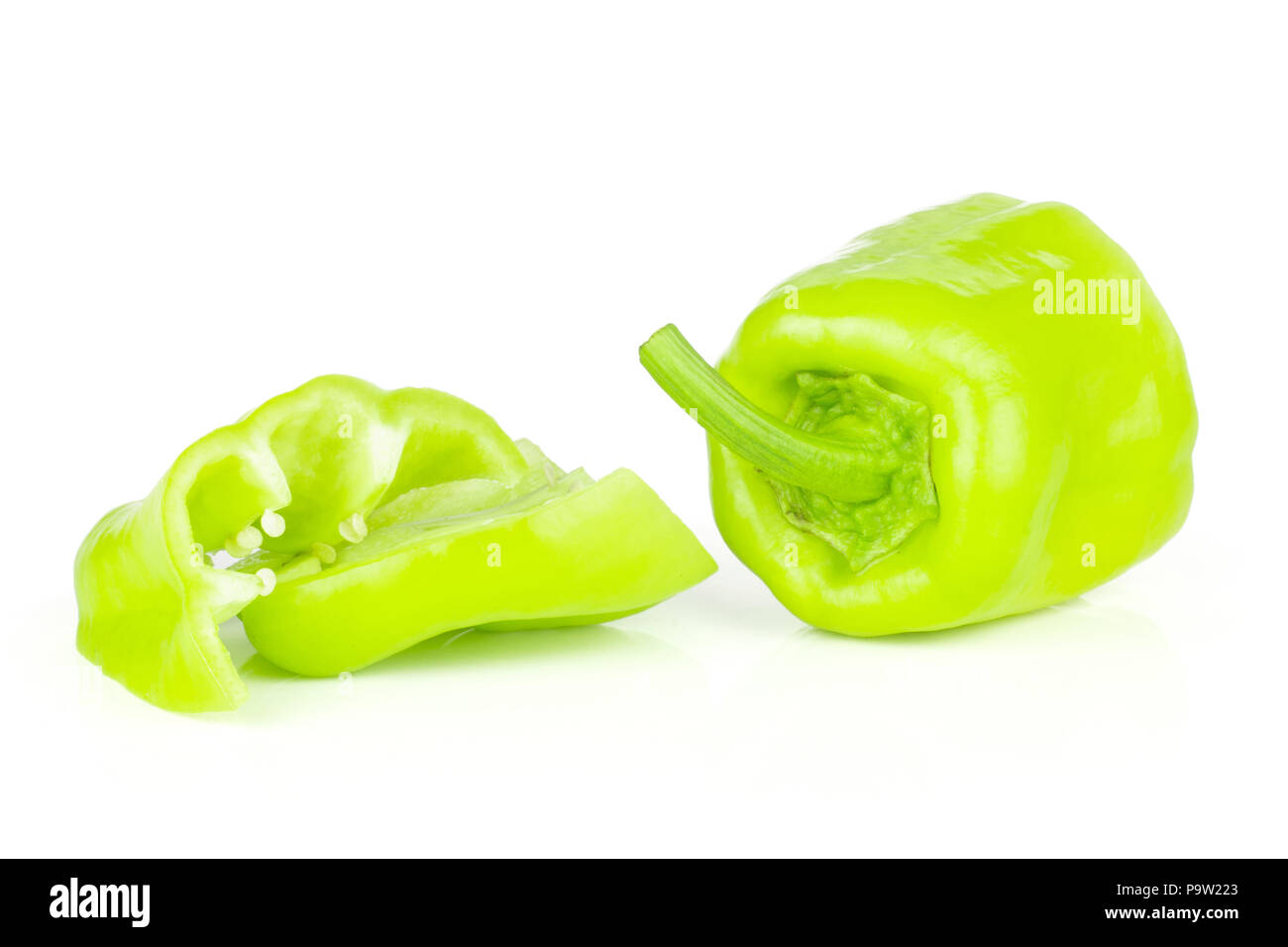 Group of one half two slices of light green bell pepper isolated on ...