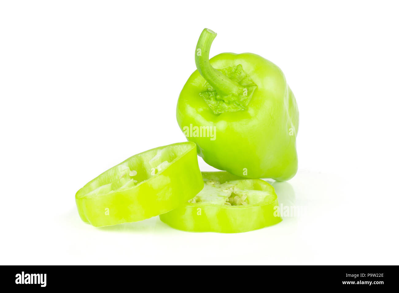 Group of one whole two slices of light green bell pepper isolated on ...
