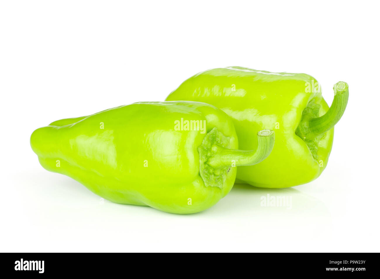 Group of two whole light green bell pepper isolated on white Stock ...