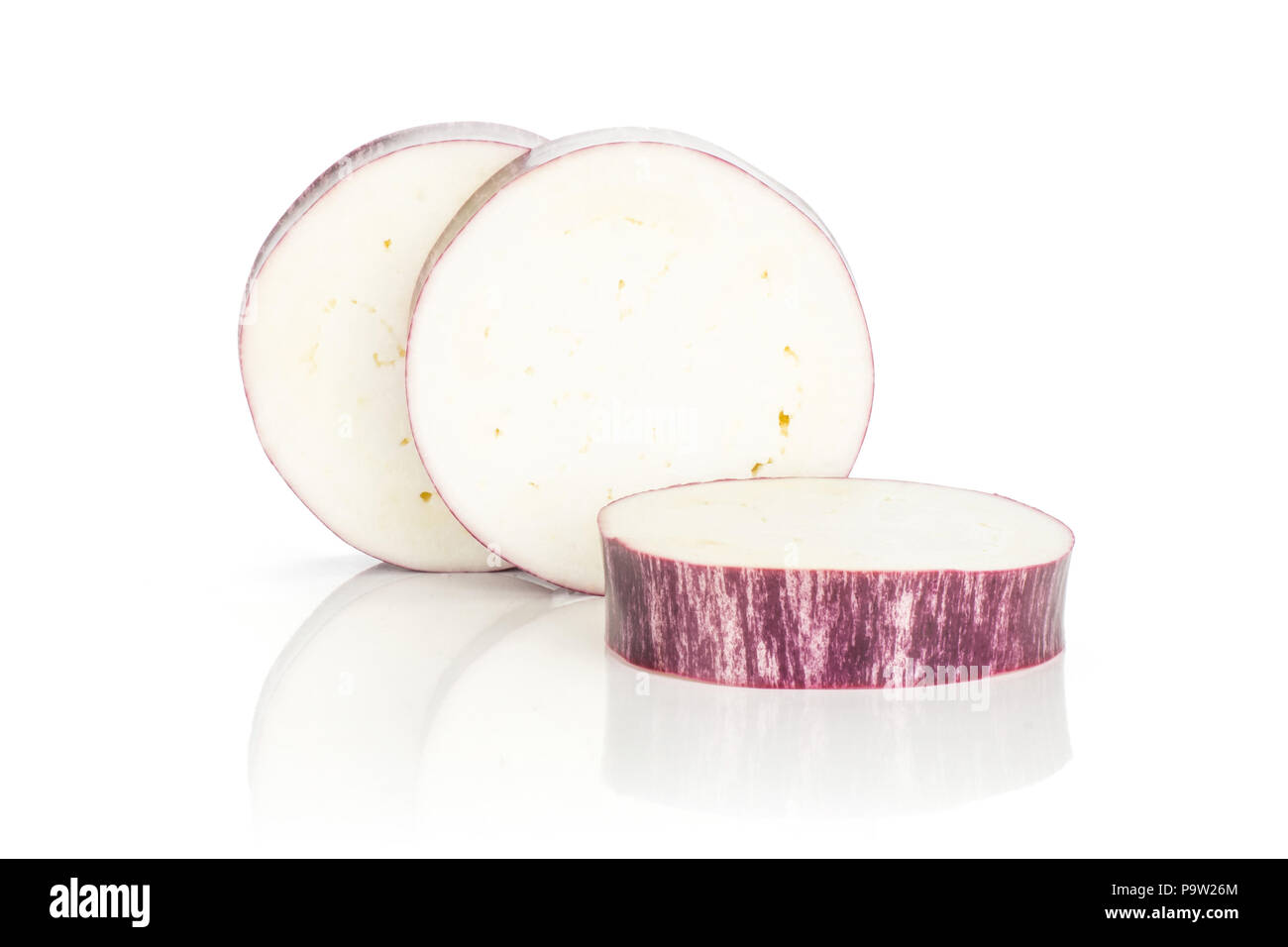 Three striped purple eggplant rings isolated on white background Stock ...
