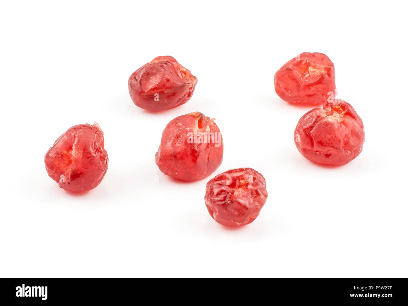 Six red dry cherries isolated on white background Stock Photo - Alamy