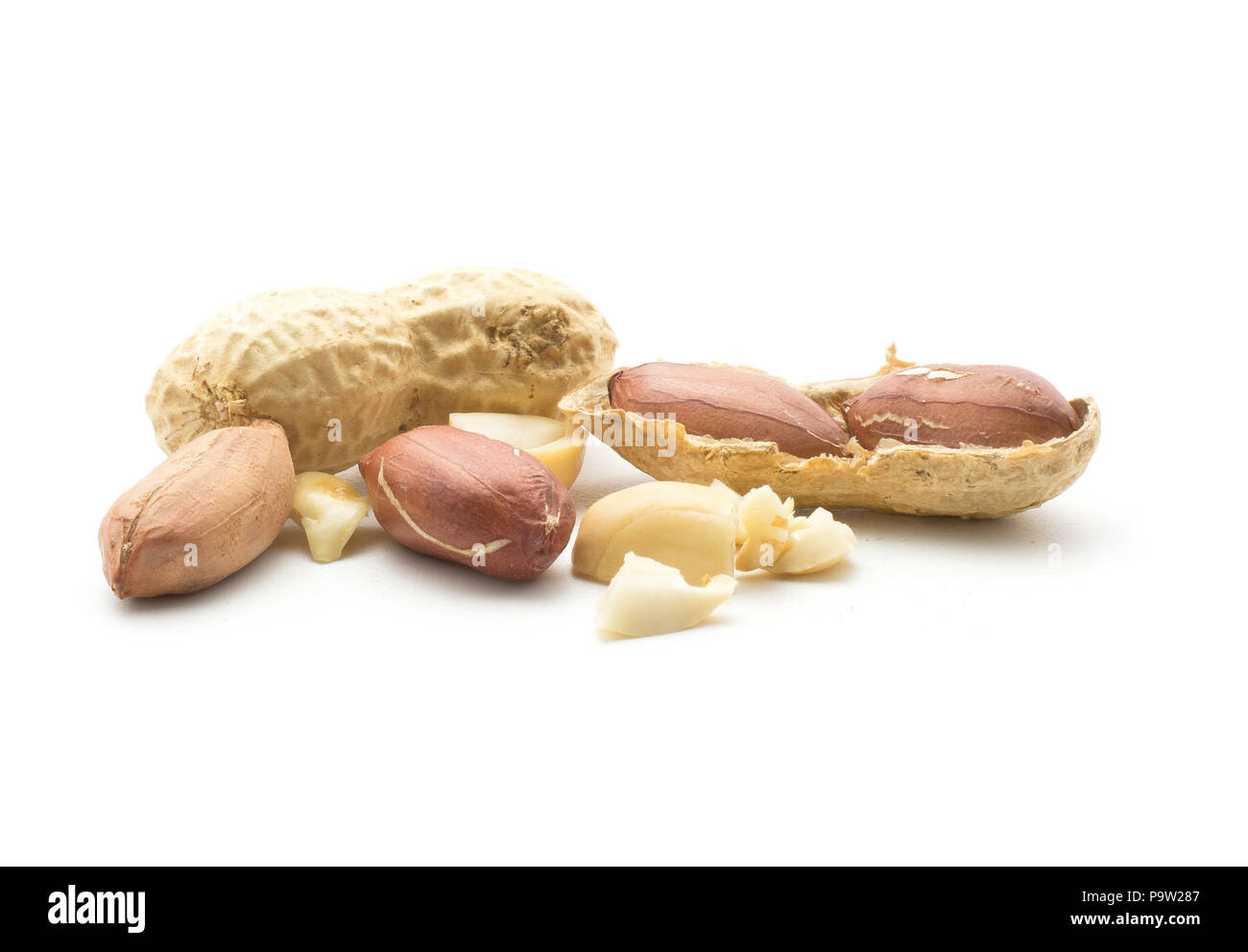 Peanuts (open, seeds, in husk, broken pieces, one whole) isolated on ...