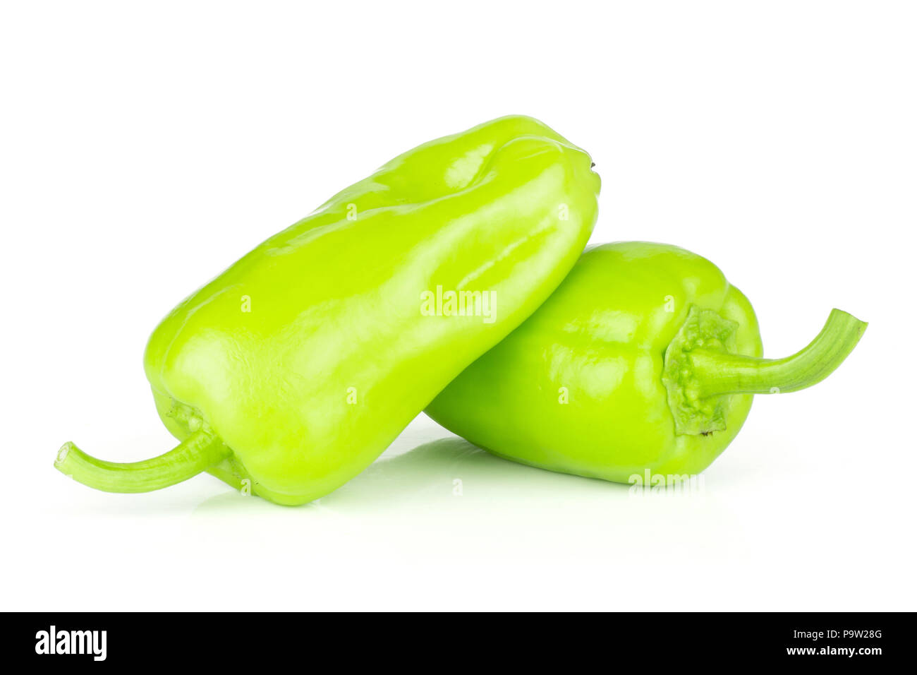 Group of two whole light green bell pepper isolated on white Stock ...